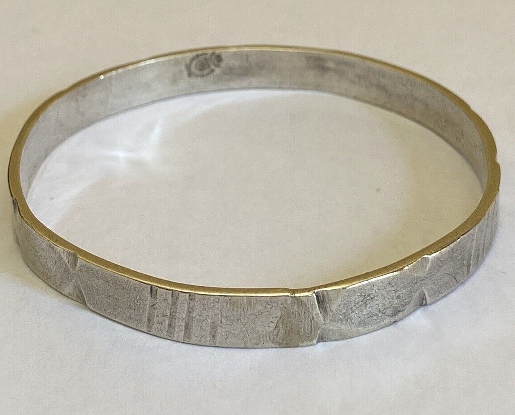 Unusual mark on silver bangle. Crescent moon and star above a shield ...